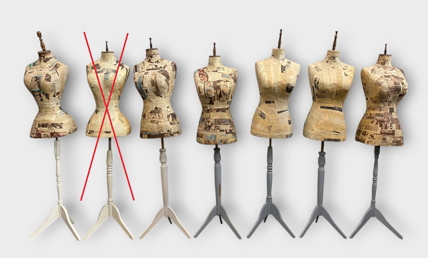 Female mannequin with newspaper-covered body on 3-legged base | Ódon ...